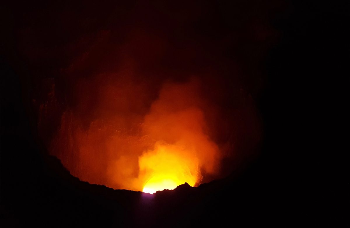 Volcano Lava Pit A Close Up Of A Fire Pit With Rocks Photo